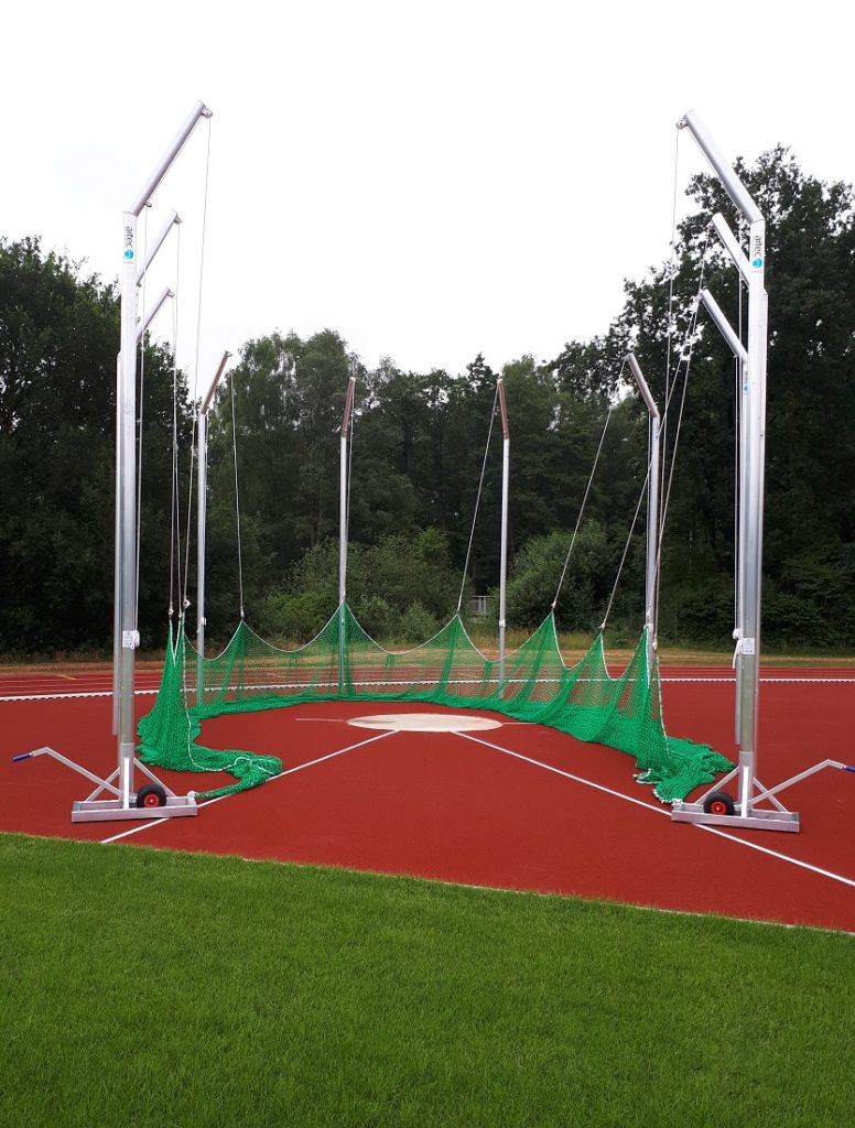 High jump facility (IAAF) with support grid and cover